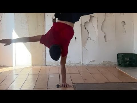 broke the Israeli record for one arm handstand hold - or sagiv - one ...