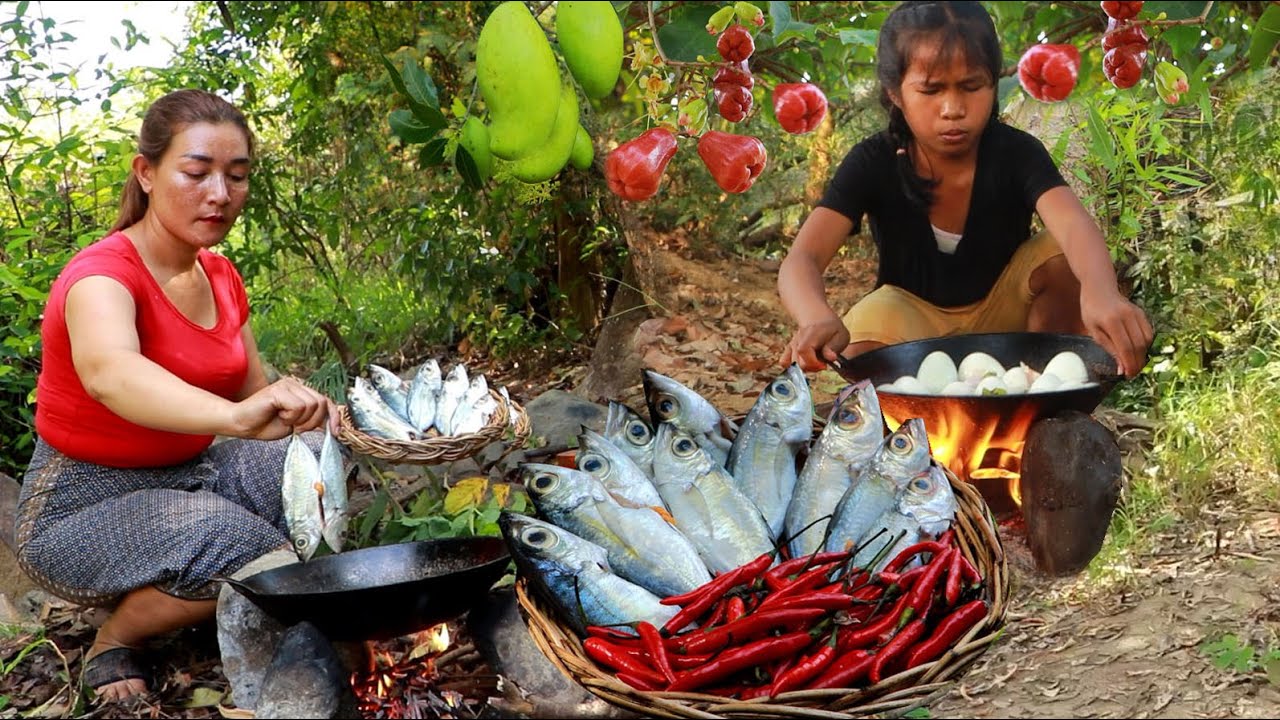 Survival cooking in forest- Cooking fish with mango sauce and boiled ...