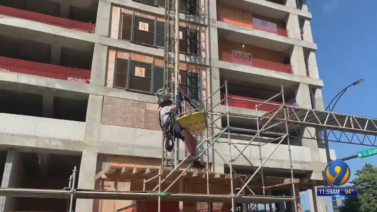 Firefighters rescue injured worker from uptown construction site - YouTube