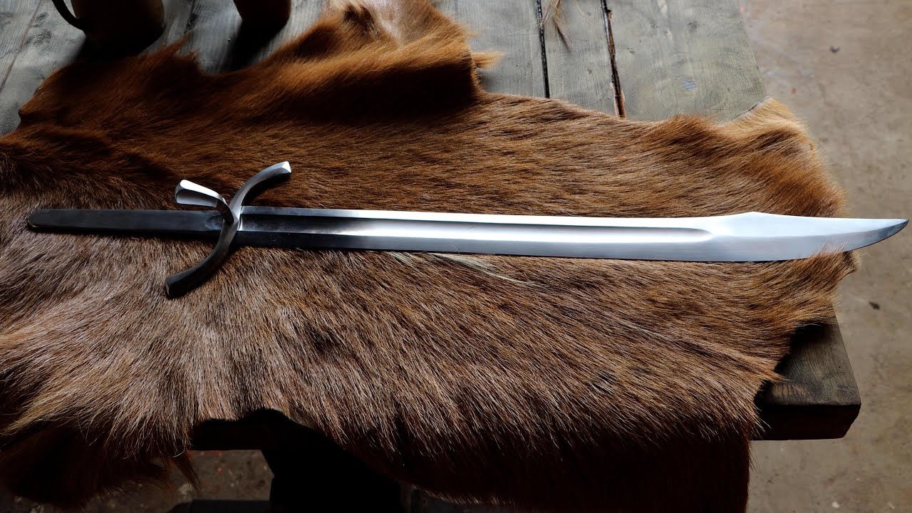 Forging a messer sword, part 3, forging the guard. - YouTube