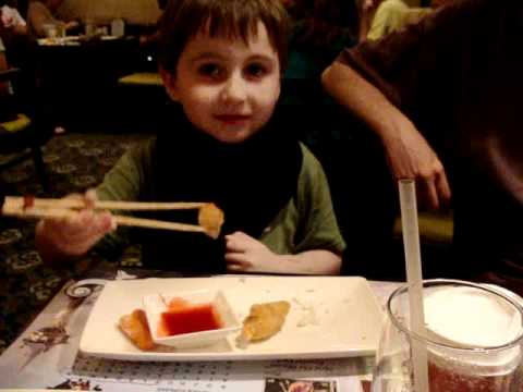 Epcot 2011_Alex 1st time with chopsticks.MPG - YouTube