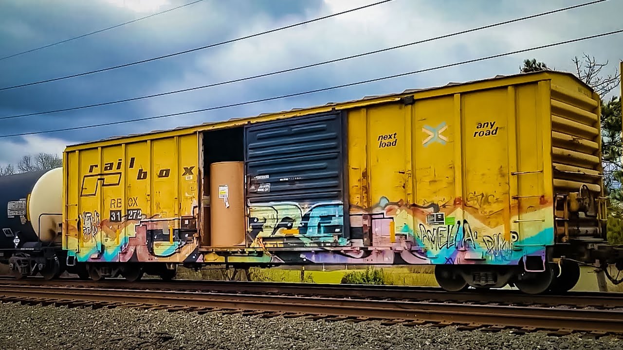 Gate runner and an open Boxcar full of Cargo - YouTube