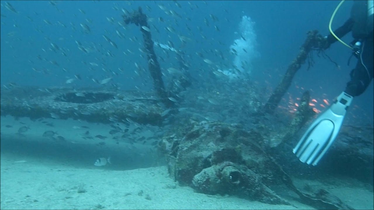Scuba diving on a WW2 German fighter plane (found ammo!) - YouTube