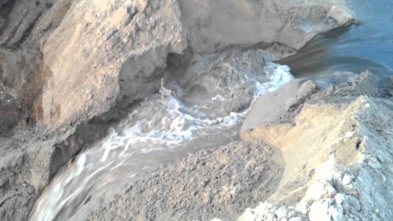 Gravel pit dike breakthrough (on purpose) Part 1 of 2 - YouTube