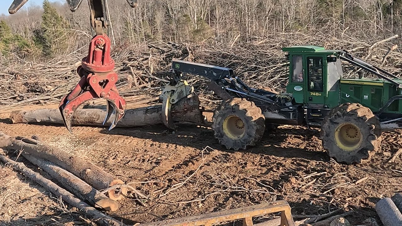 Final clean up on this log yard - YouTube