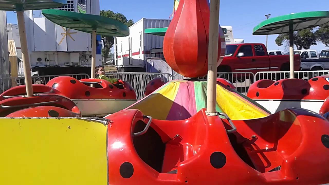 Alex riding the lady bug ride at the asparagus festival 4-15-16 - YouTube