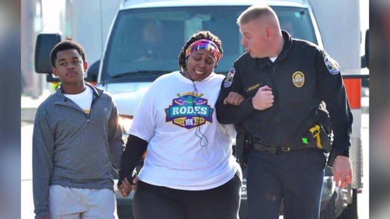 Inspiring Photos of A Cop Helping Runner Finish 10k Go Viral - YouTube