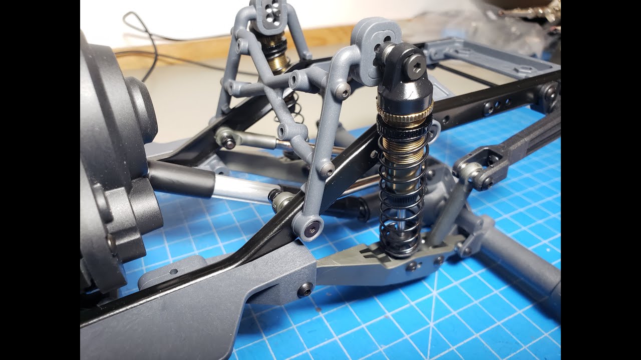 Element RC Gatekeeper Part 5 Drives Shafts and Shocks - YouTube