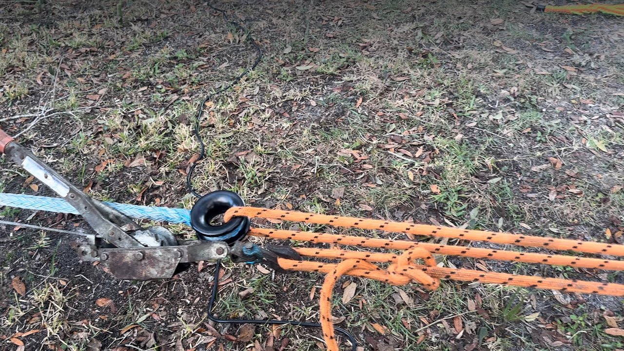 Hoisting a submerged boat with tree gear! - YouTube