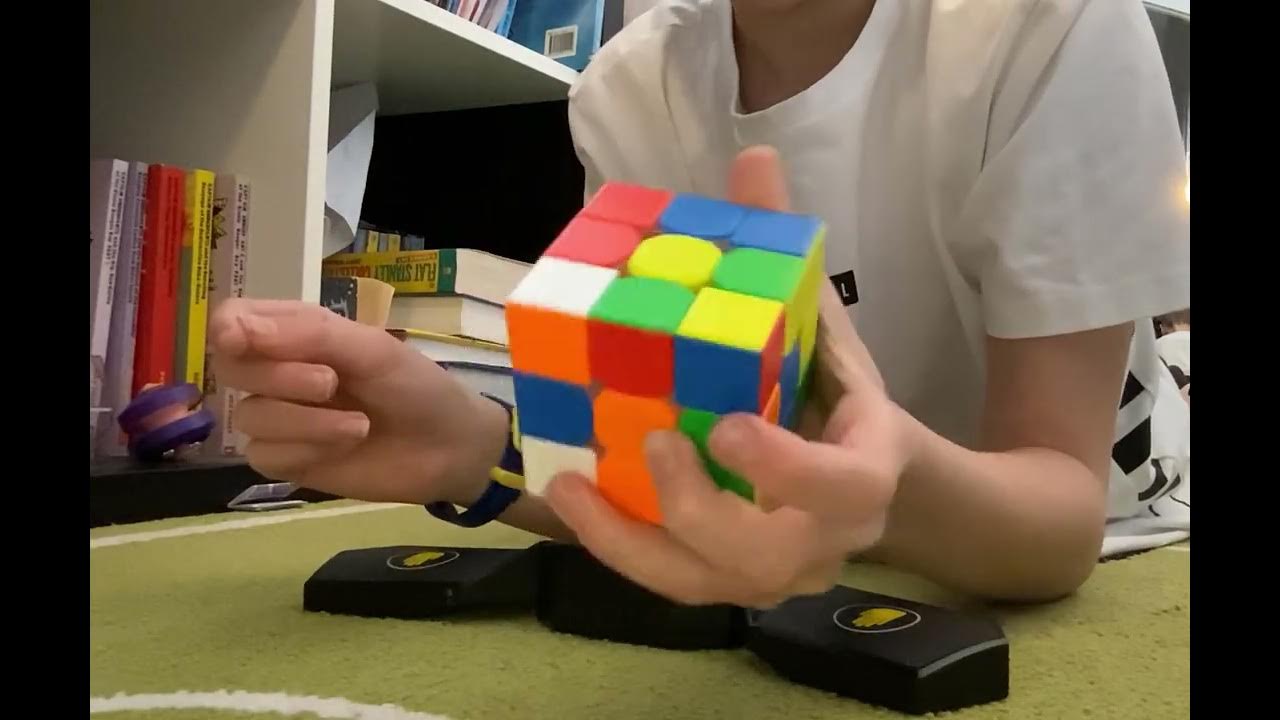 Solving all of my gan cubes one handed - YouTube