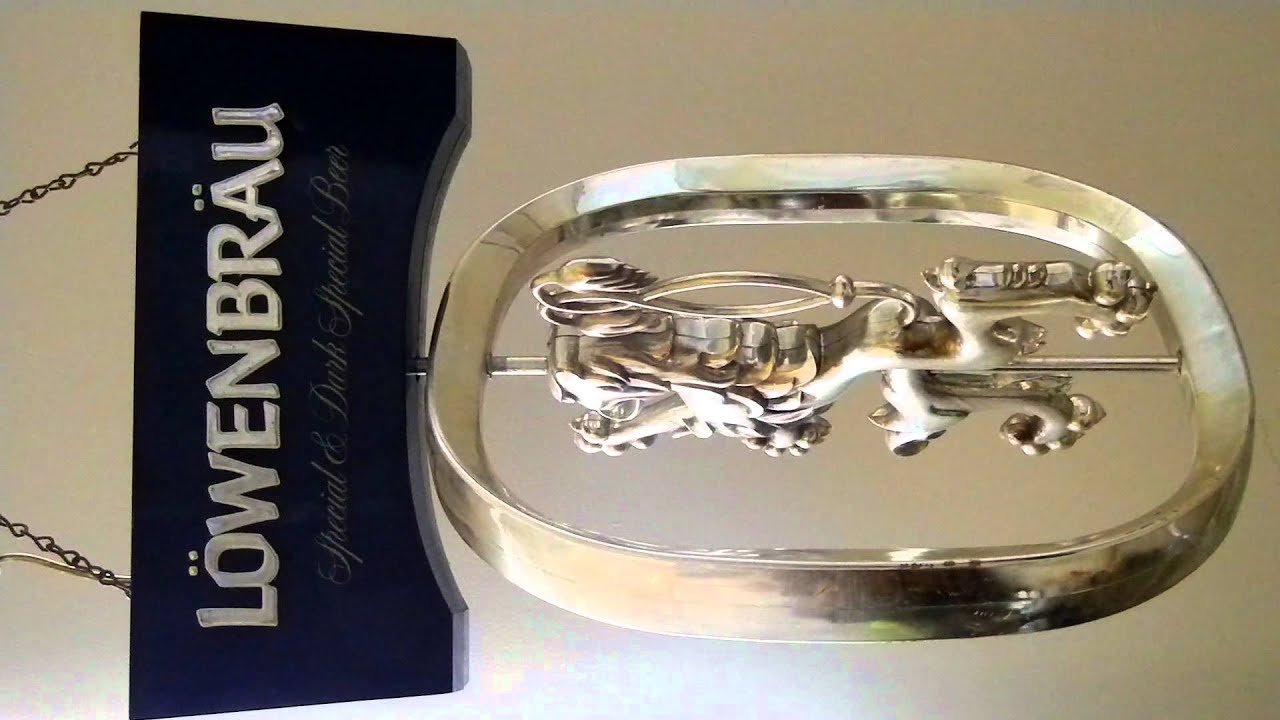 vintage spinning lowenbrau beer sign - YouTube