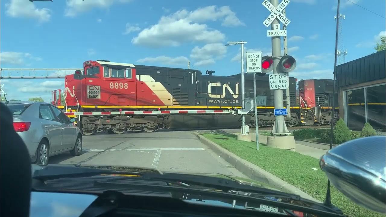 CN 8898 (Heritage Unit) and CN 8016 shove a train through Ferndale, Michigan (8/18/2023) - YouTube