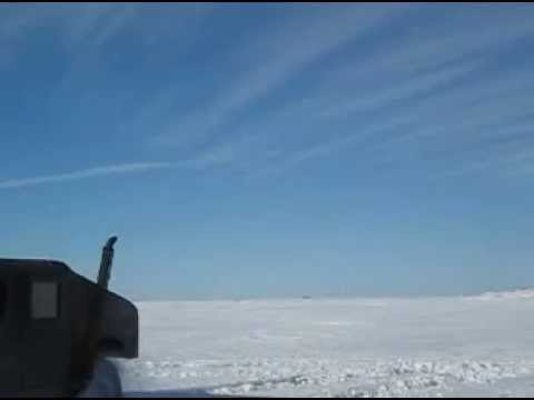 HMMWV with chains in some deep snow - YouTube