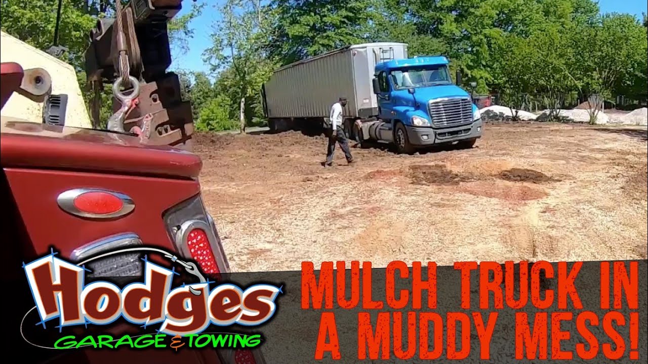 MULCH TRUCK IN A MUDDY MESS! - YouTube