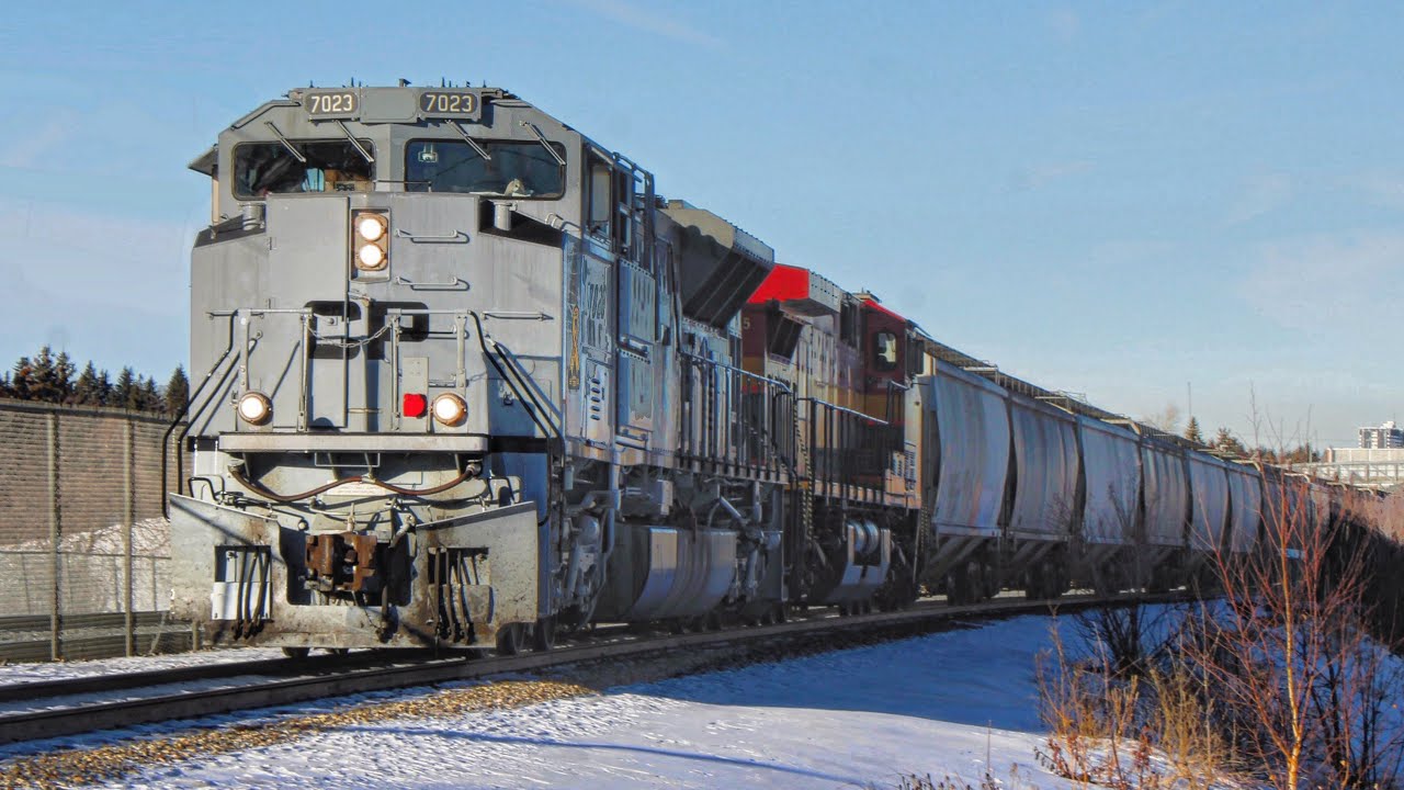 VERY RARE! CP 7023 Veteran unit leading CP Grain train Southbound near ...