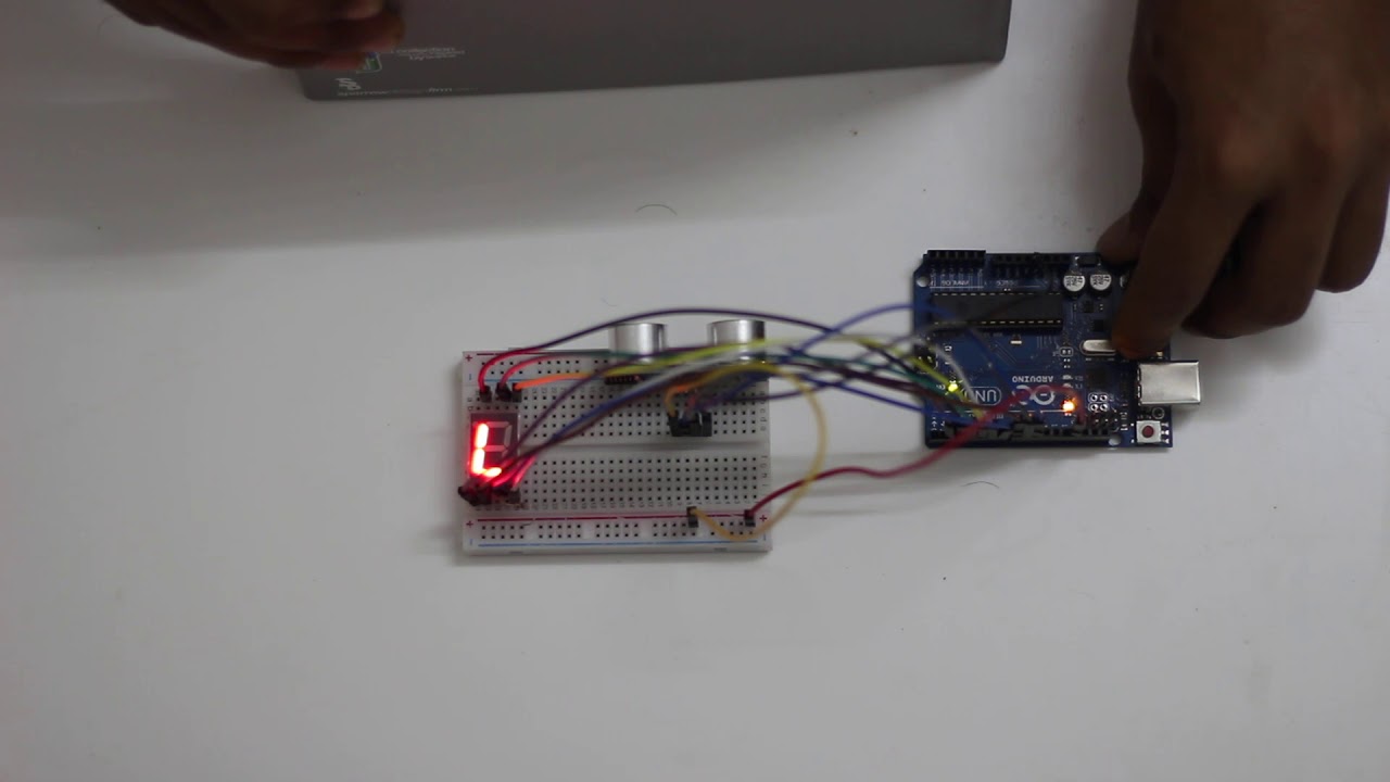 Design a height Gauge using 7 segment display and ultrasonic sensor ...