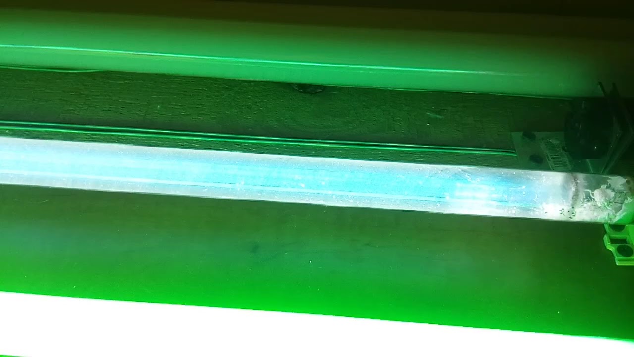 A clear fluorescent tube on programmed start ballast. - YouTube