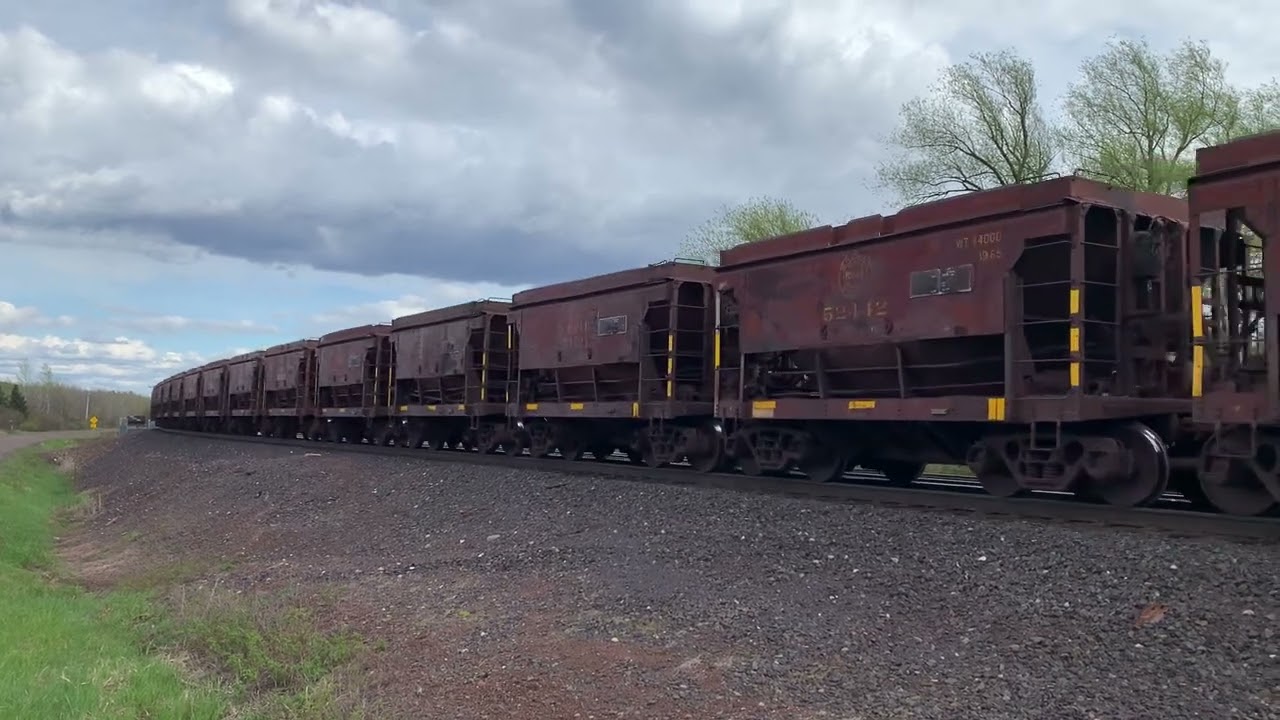 Illinois Central SD40-2’s and repowered DMIR SD45T-2 (SD40-3) with an empty ore train. - YouTube
