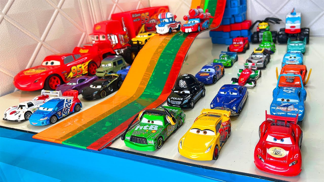 Disney Pixar Cars, Various Cars miniature cars roll down a colorful ...