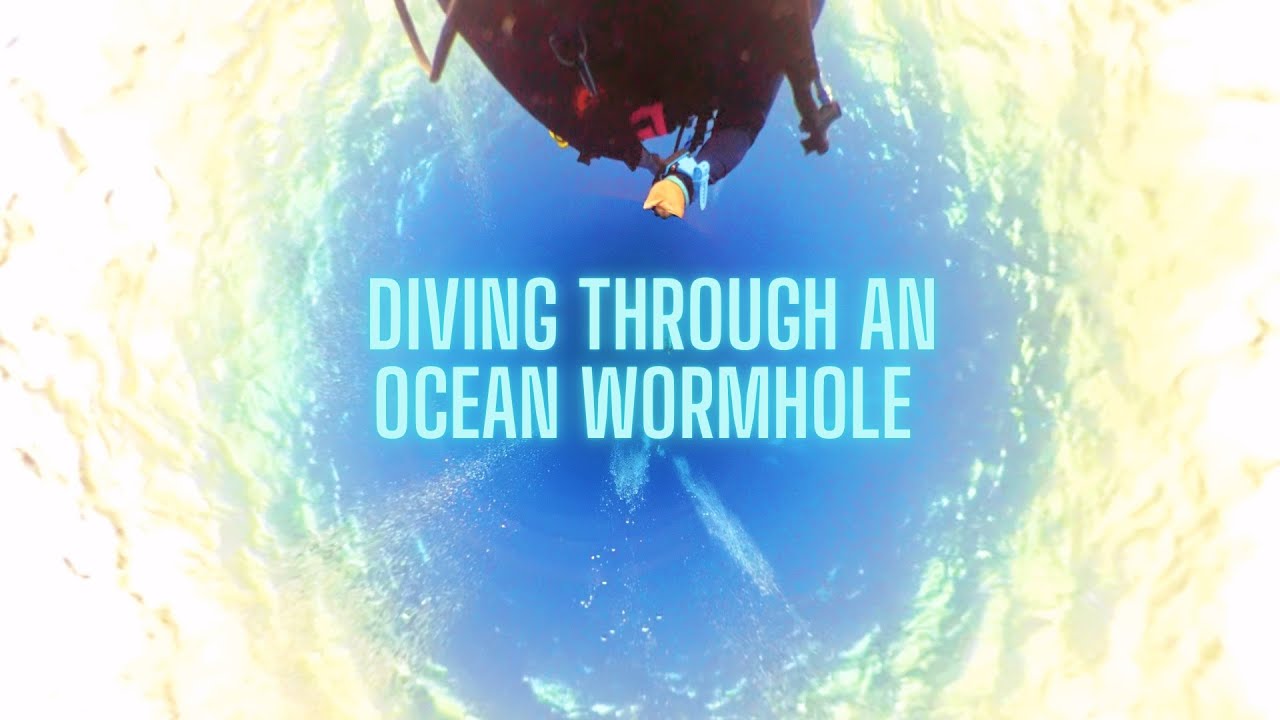 Diving through an ocean wormhole - YouTube