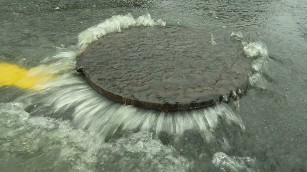 Manhole over flowing from stormwater - YouTube
