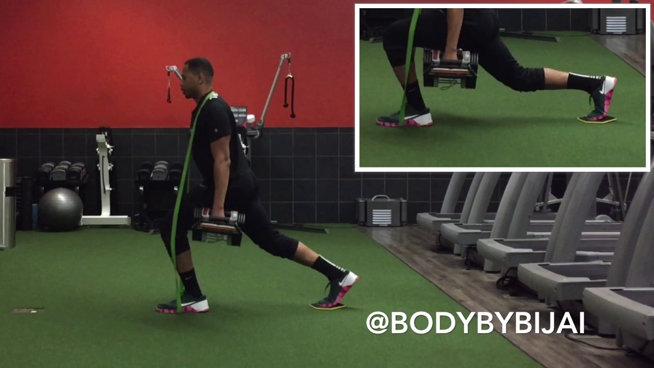 Banded reverse dumbbell lunge on sliders - YouTube
