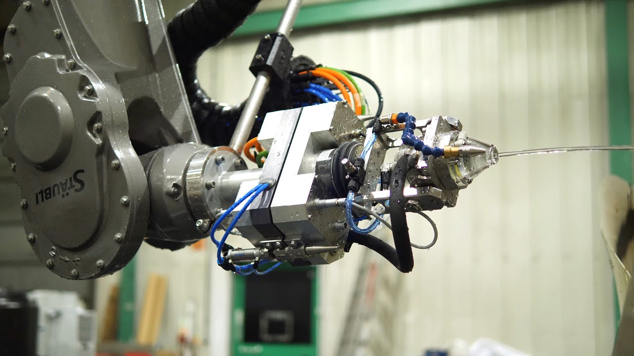 Mid-build testing of dual robot ultrasonic inspection machines. - YouTube