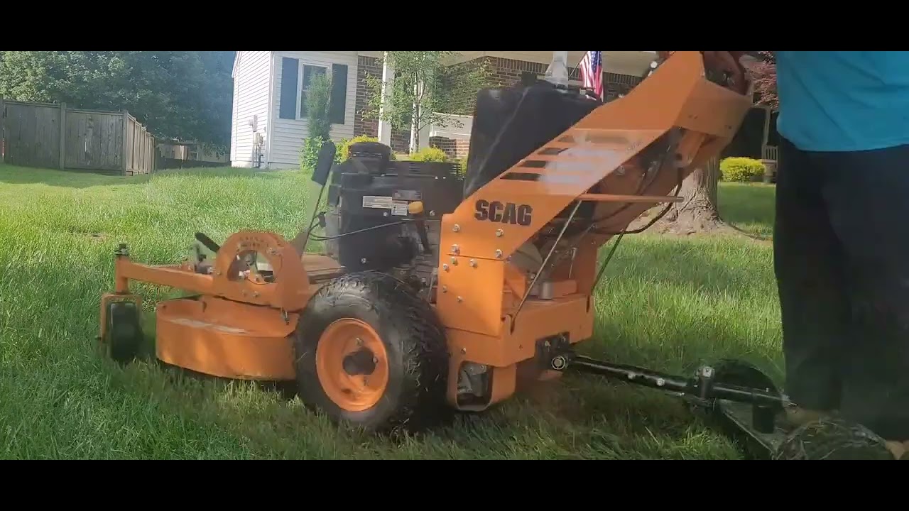 Mowing with 36in scag walk- behind and wheel attachment - YouTube