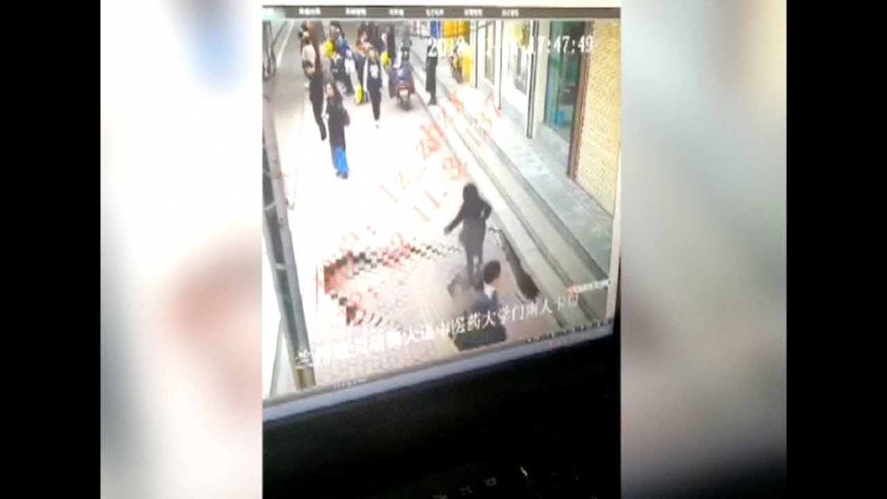 Woman Falling into Collapsed Sidewalk Saved - YouTube