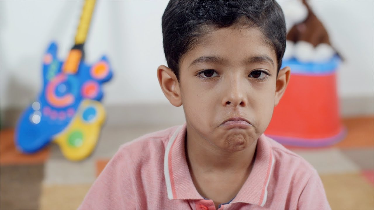 Closeup shot of a cute Indian boy kid making sad face | Indian Stock ...