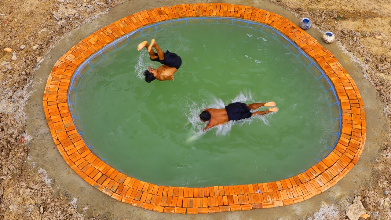 Build Most Beautiful Swimming Pool In Front Of Five - story Mud Hotel ...