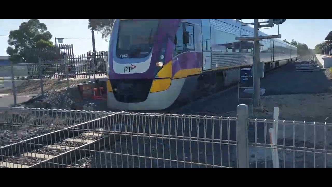 Australian VFT Service (Very Fast Train) flies through the station at ...