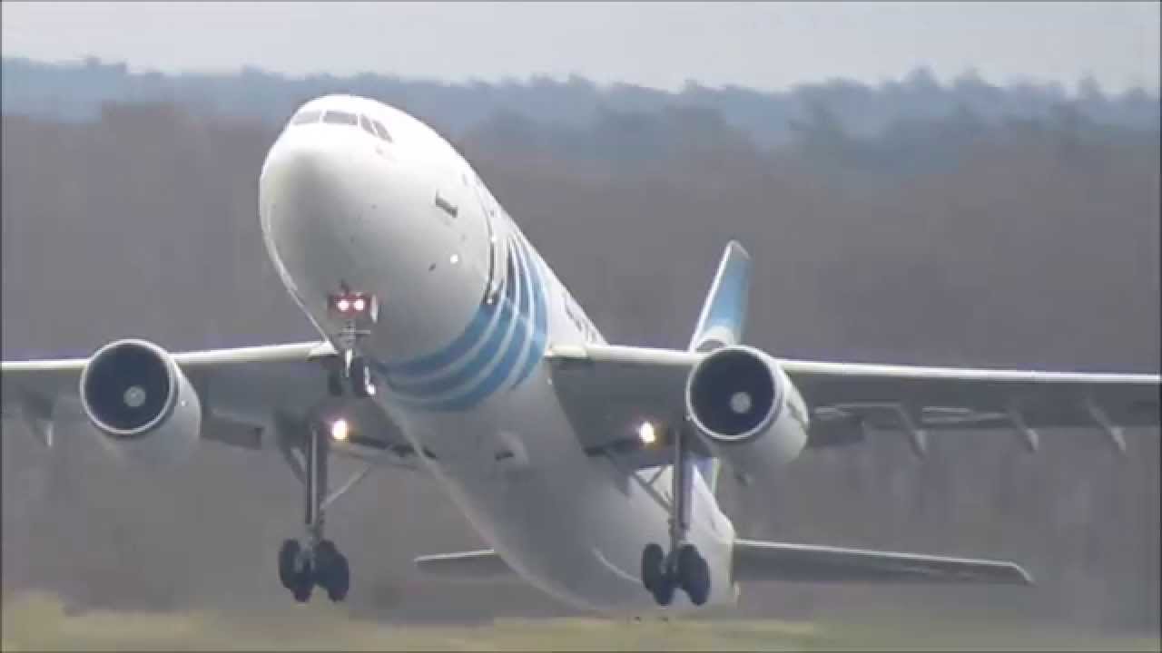Landing British Aerospace 146 and takeoff EgyptAir Cargo Airbus A300 at ...