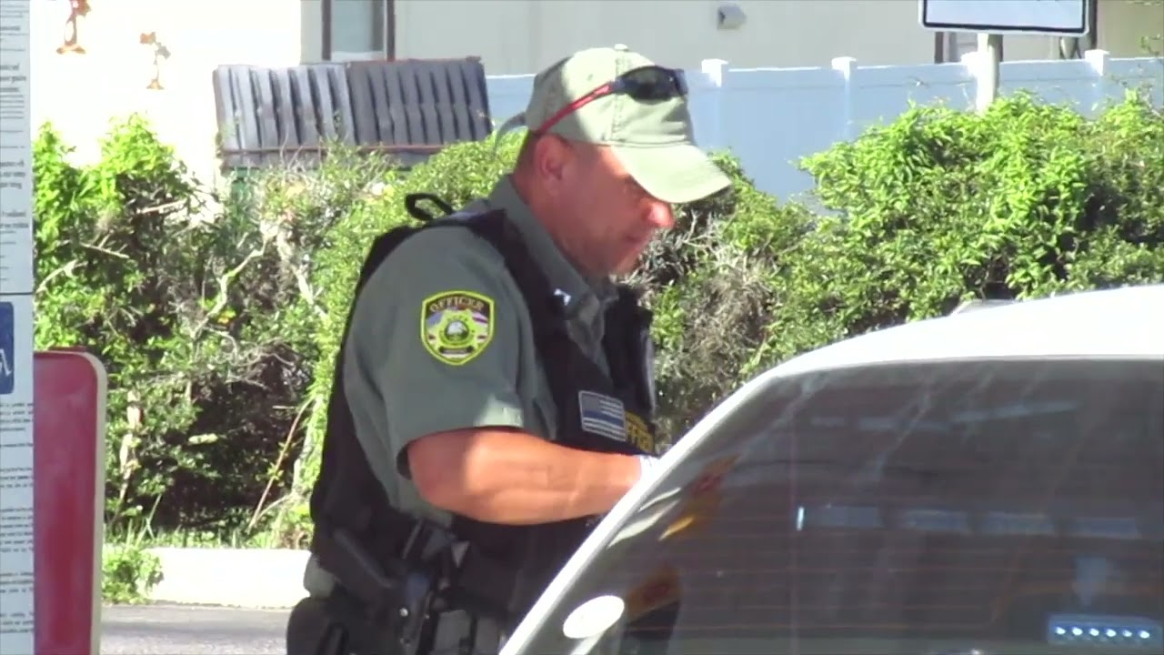 Suspicious Security/ENFORCEMENT OFFICER & HOWARD doesn't like CAMERAS ...