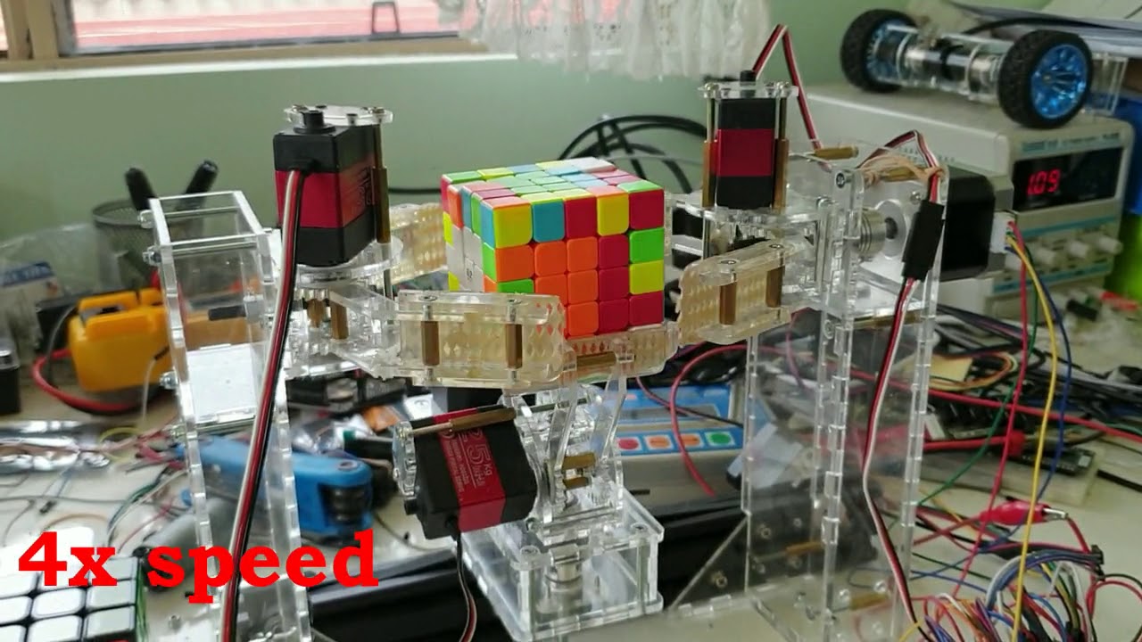 5x5x5 Rubik's Cube solving robot solves a cube - YouTube