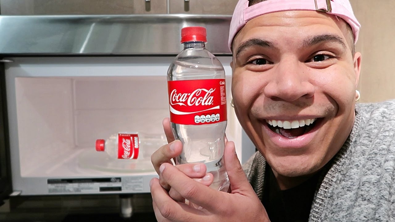 WHAT HAPPENS WHEN YOU MICROWAVE COCA COLA? - YouTube