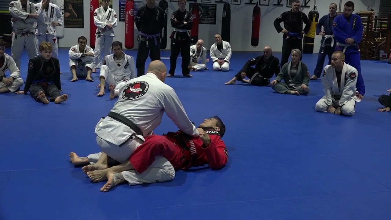 Keeping a standing opponent inside your closed guard - YouTube