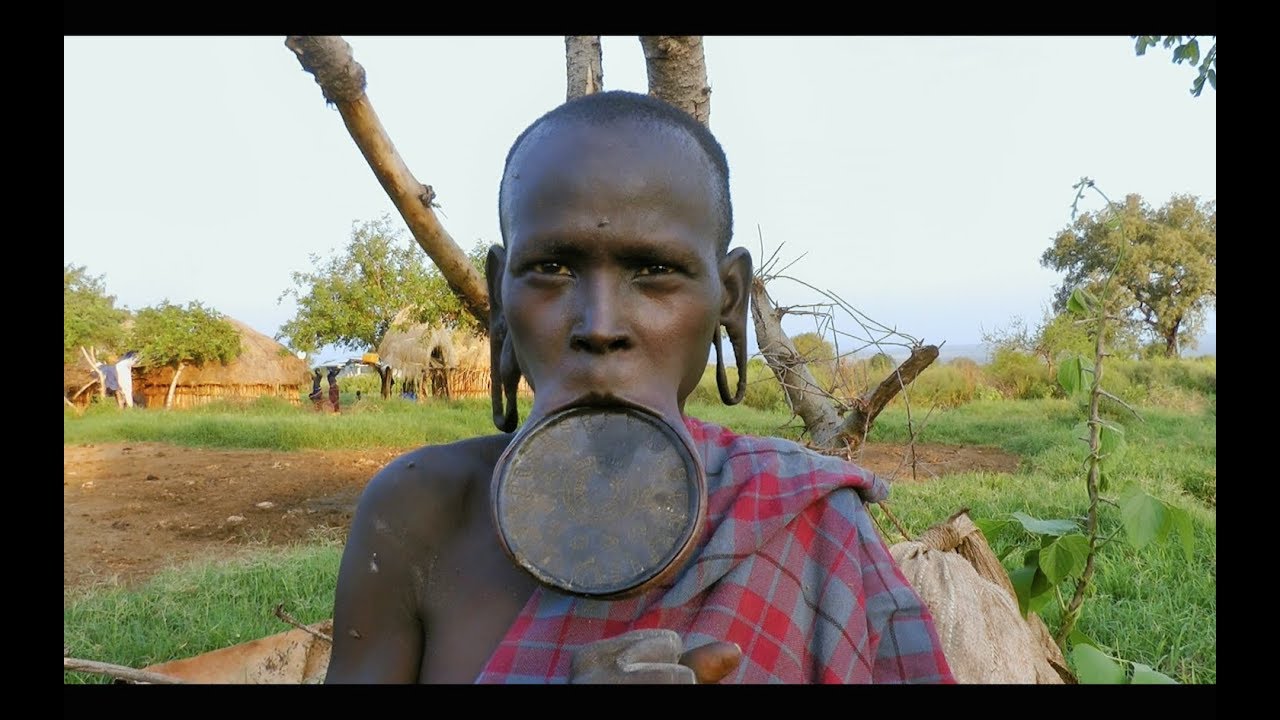 Walking with the Mursi - YouTube