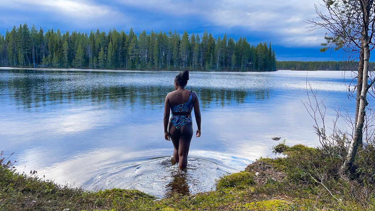 First time cold water swimming in a lake - spring in Northern Sweden ...