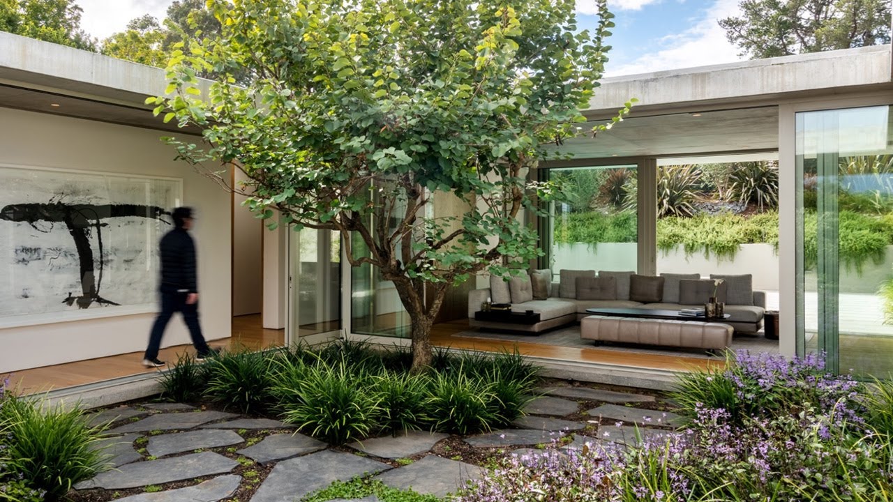 A Beautiful Modern House With A Small Courtyard And Great Natural ...