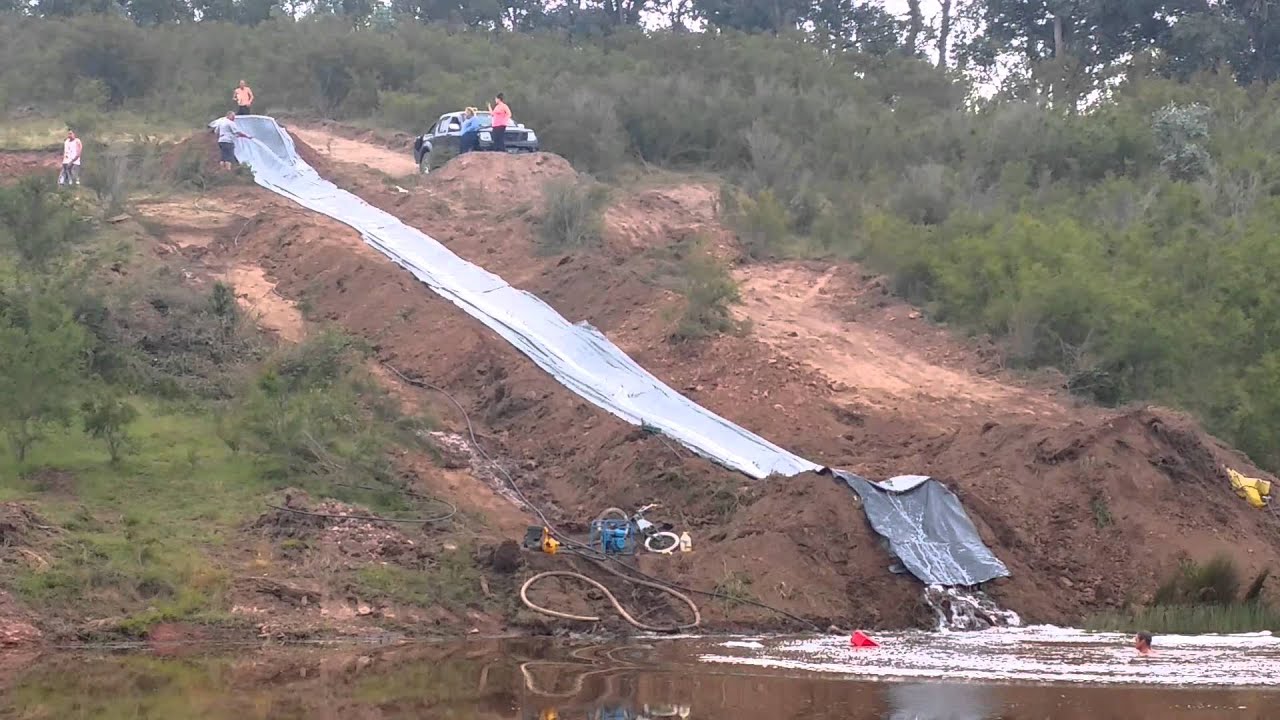 60 Meter Slip'n'Slide into Dam Jump - YouTube