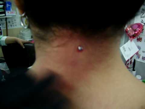 "back of the neck" dermal by pinhead of bigappletattoo - YouTube