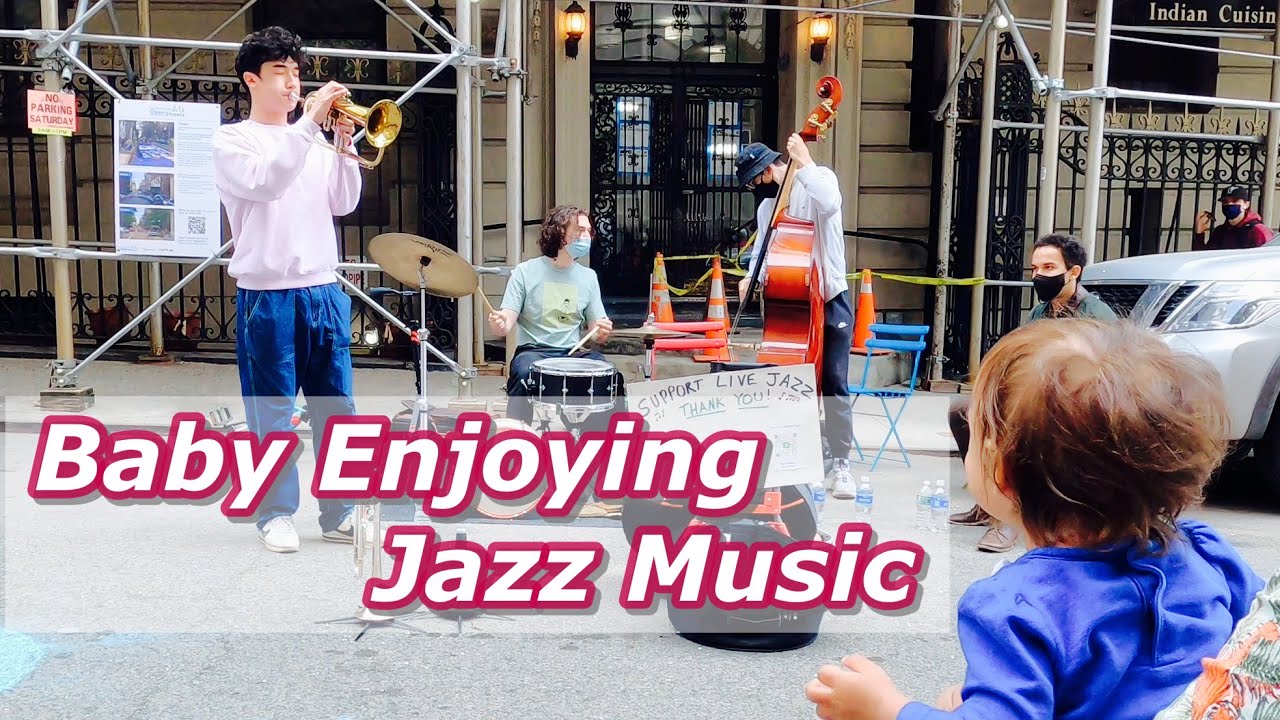 Baby enjoying live jazz music in NYC, Earth Day Celebration, 4K Ultra ...