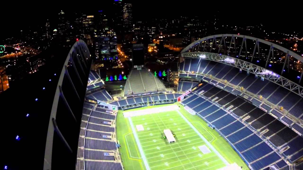 Above Seattle: Drone flies over Seattle at night - YouTube
