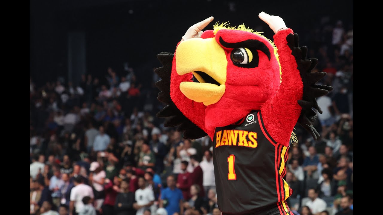 Young Hawks fan beats team mascot in epic dance battle - YouTube