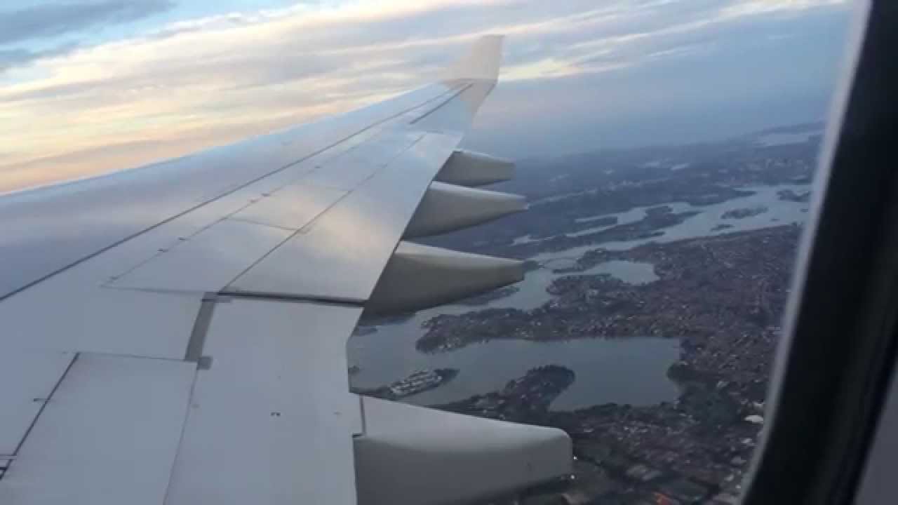 Plane taking off over Sydney (passenger view) - YouTube