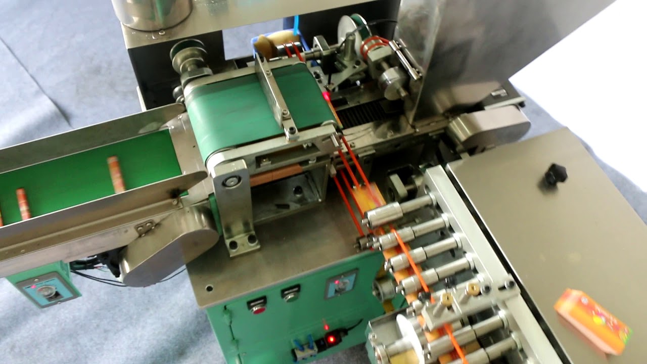 Crayon Labelling Machine/Crayo label wrapping Machine/蜡笔卷纸机/蜡笔贴标机 - YouTube