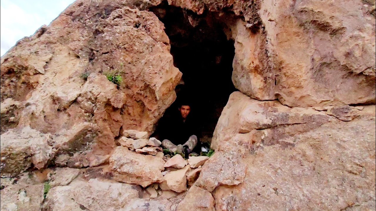 Transforming an abandoned cave into a safe and warm shelter, preparing ...