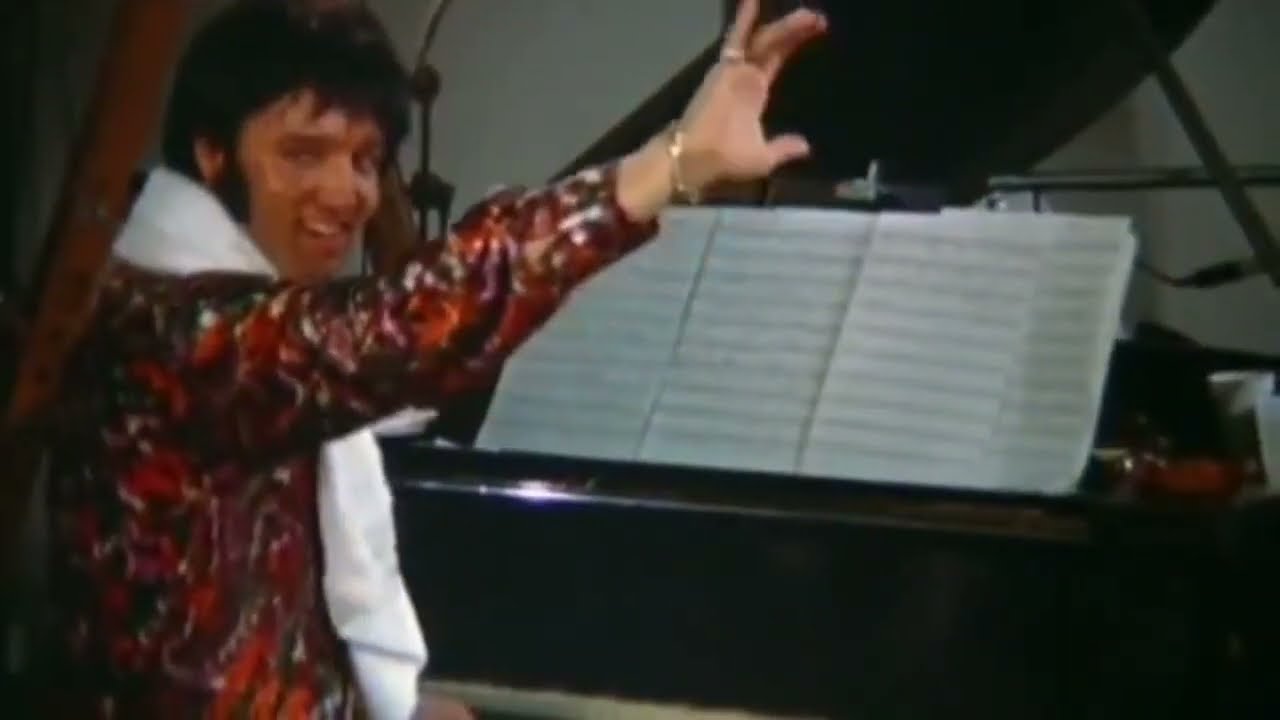 Elvis, playing piano during a studio break... - YouTube