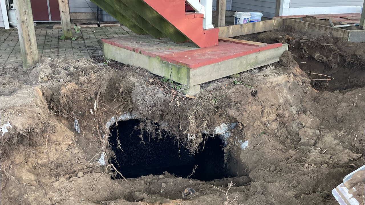 Collapsing a tank under a deck. Installing two new tanks. - YouTube